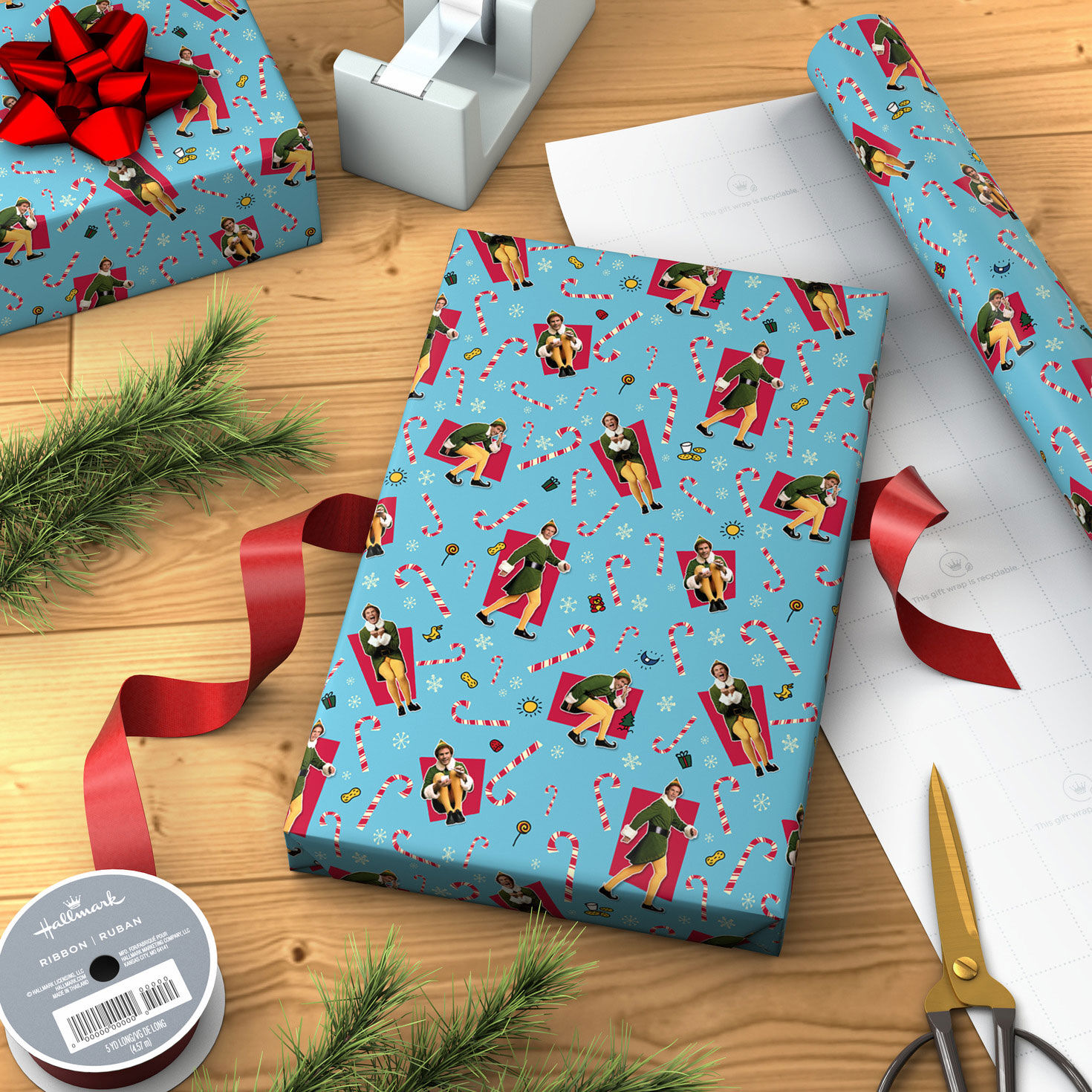 Elf Buddy the Elf™ Poses on Blue Christmas Wrapping Paper Roll, 25 sq ...